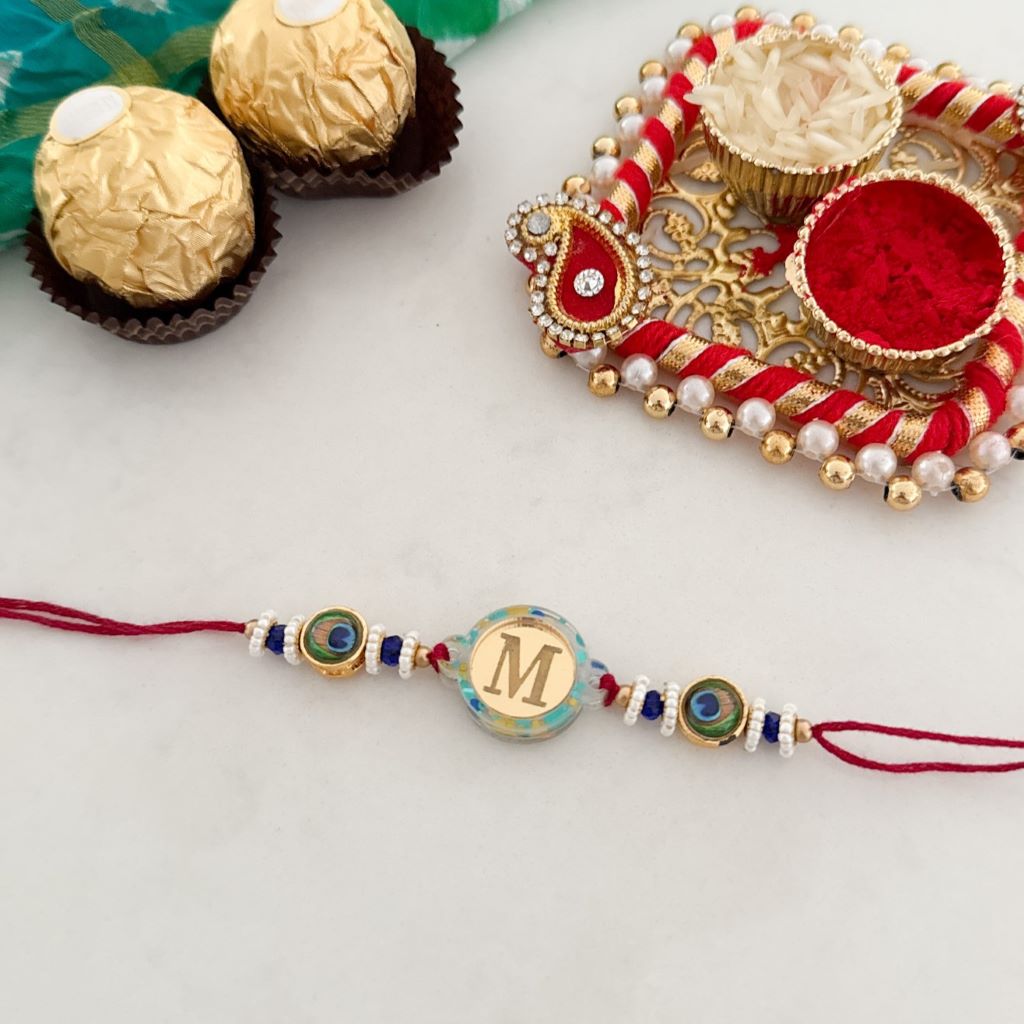 Personalised initial Rakhi Circle- Peacock – KnK krafts
